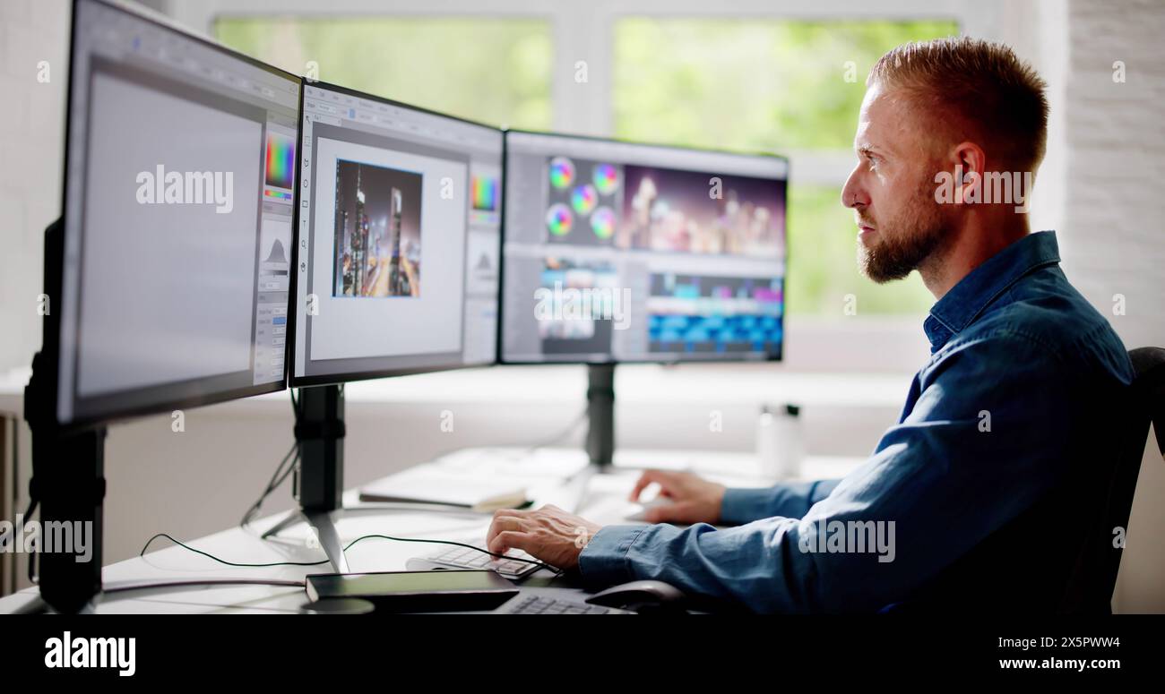 Graphic Web Designer Using Design Editing Software Stock Photo - Alamy