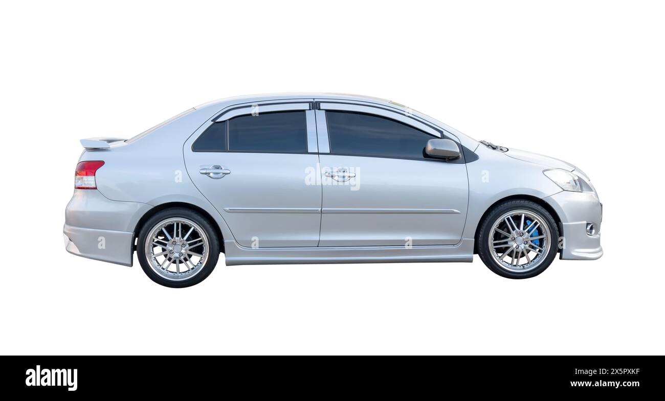 Side view of bronze sedan car is isolated on white background with ...