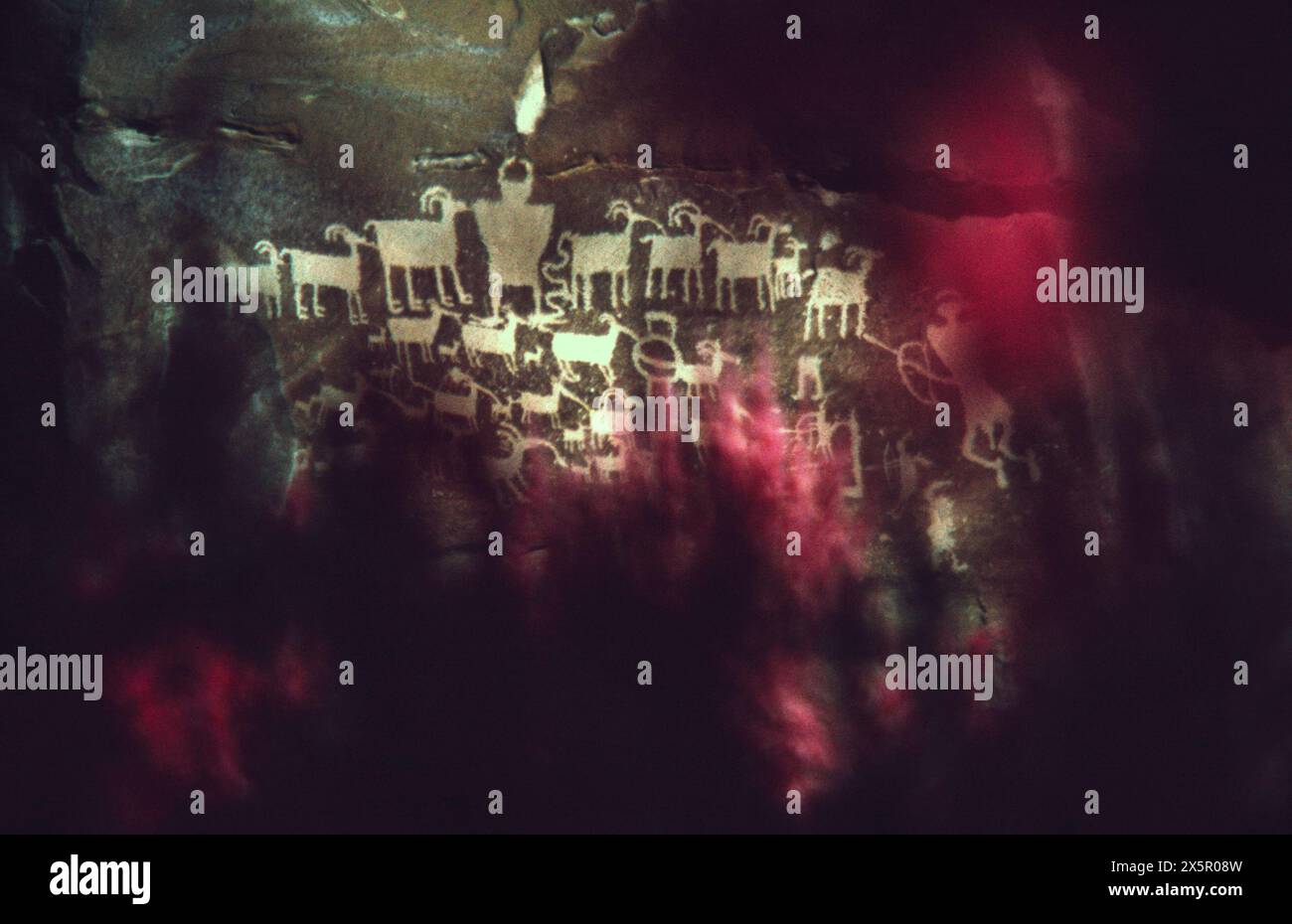 The otherworldly Great Hunt petroglyph panel captured on infrared film ...