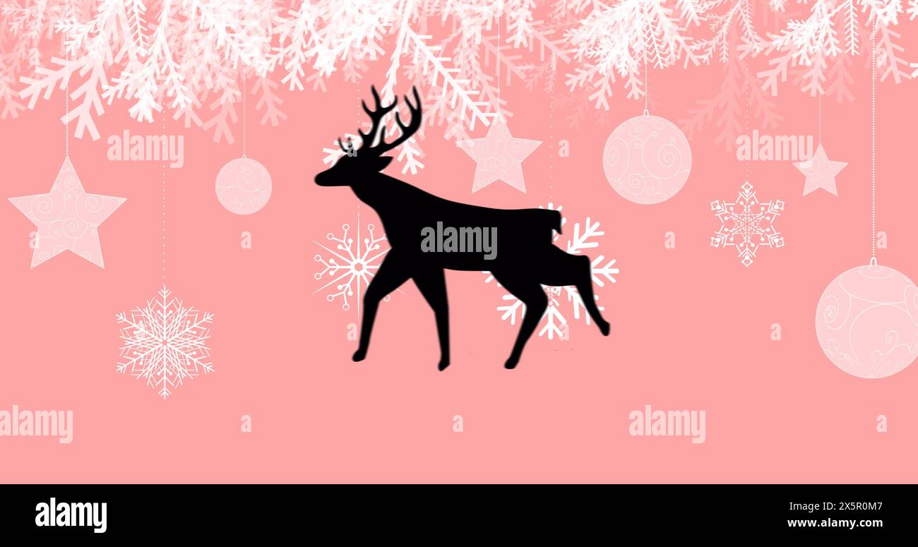 Image of reindeer over snow falling Stock Photo - Alamy