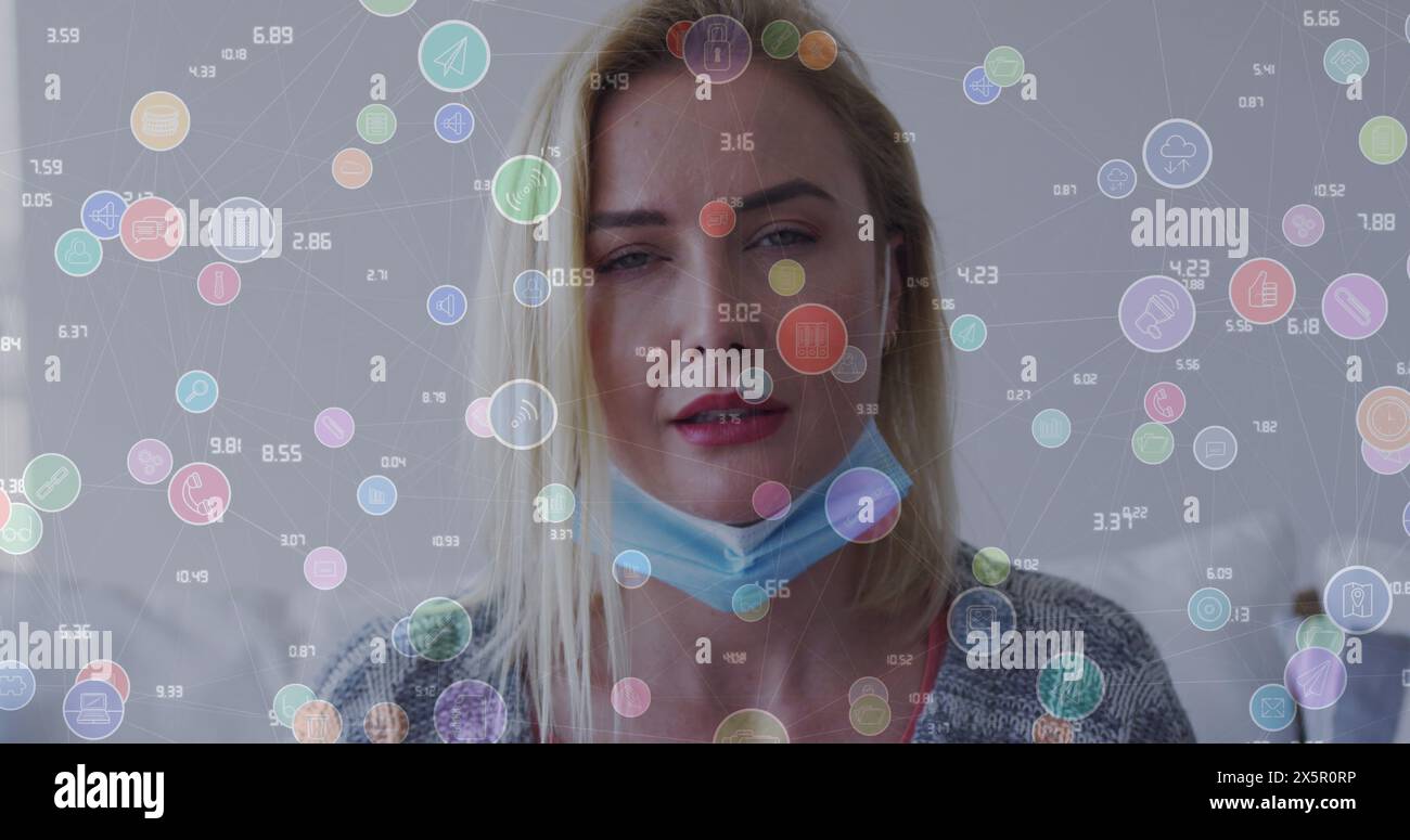 Image of network of connections with icons over caucasian woman with ...