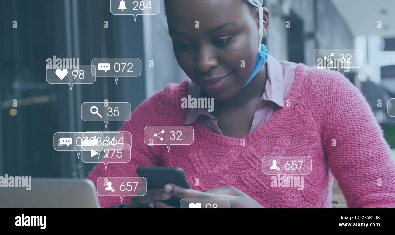 Image of social media icons with numbers over african american woman ...