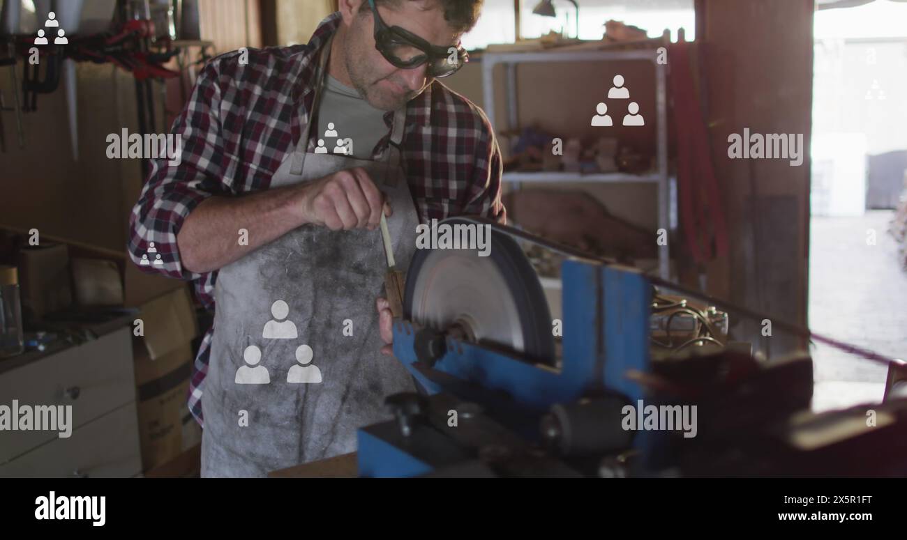 Image of people icons moving up over caucasian male mechanic using ...