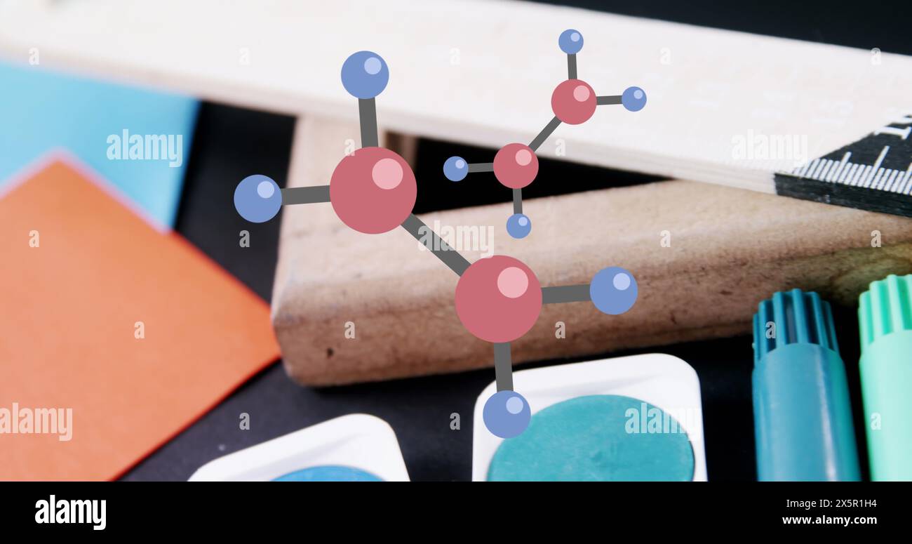Colorful markers and molecular model sitting on a school desk Stock ...