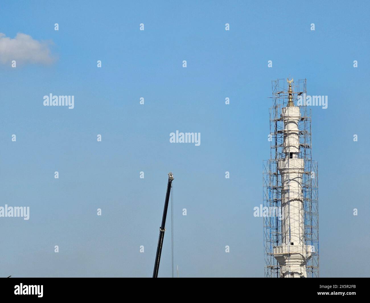 Cairo, Egypt, March 23 2024: A construction site of a new mosque with a ...