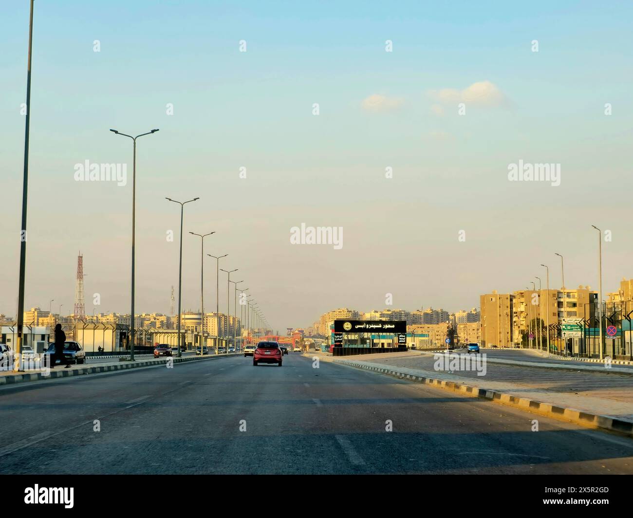 Cairo, Egypt, March 23 2024: Shinzo Abe axis patrol highway sign board ...