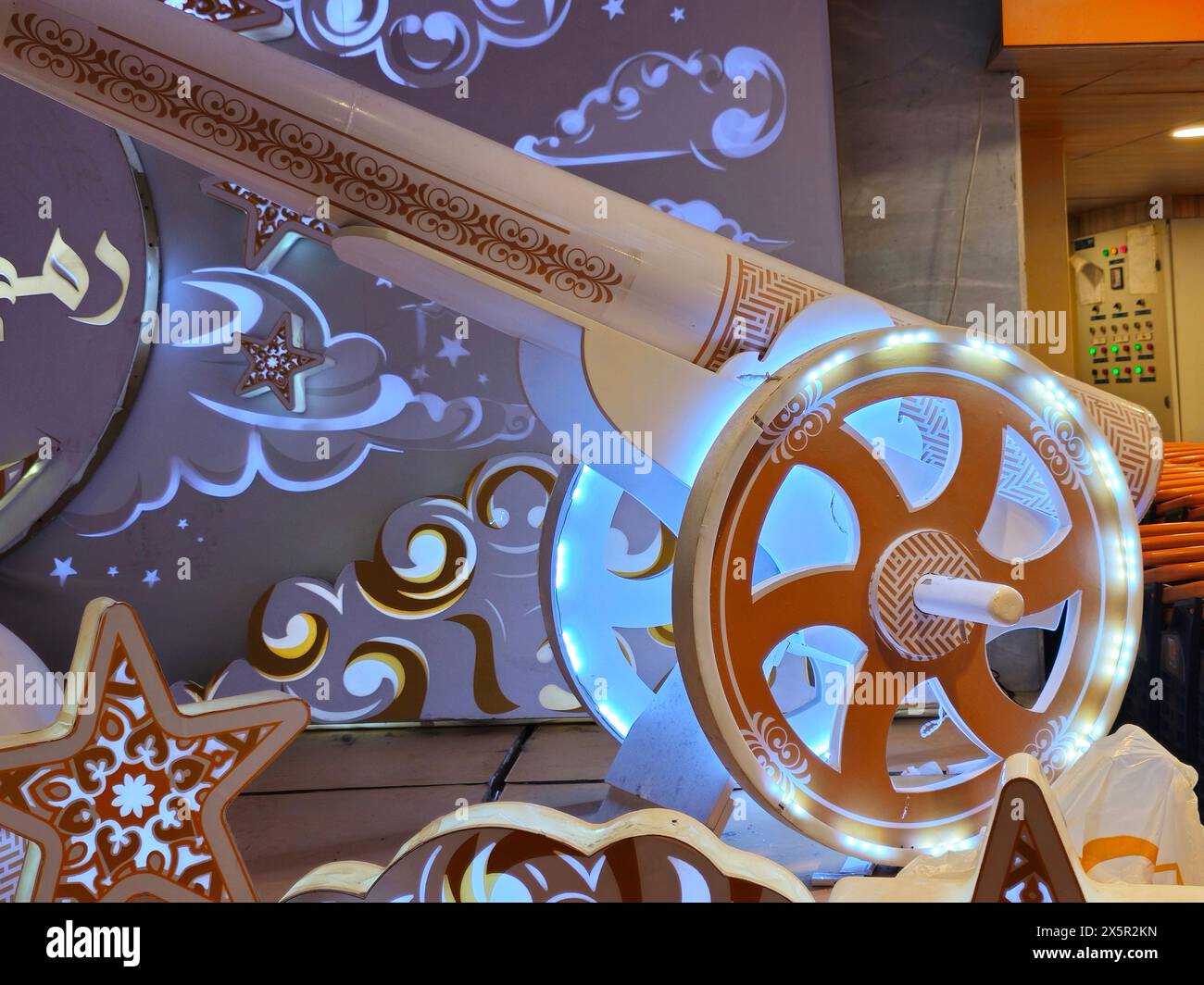 Cairo, Egypt, March 24 2024: Ramadan decoration background with a mosque dome, iftar cannon gun ...