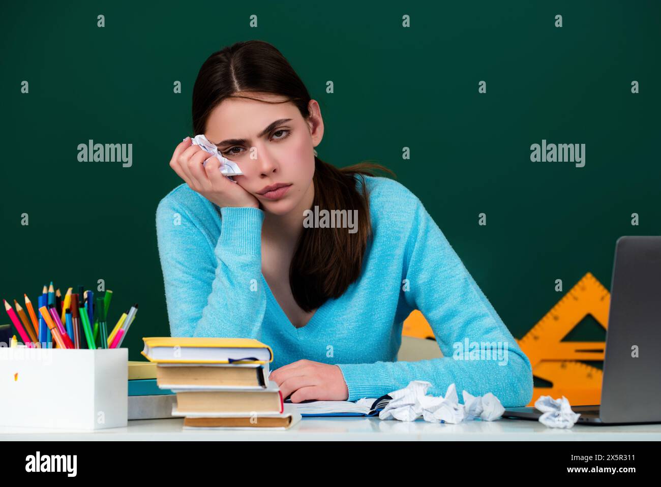 Sad school girl. Tired bored student having too much. serious student ...