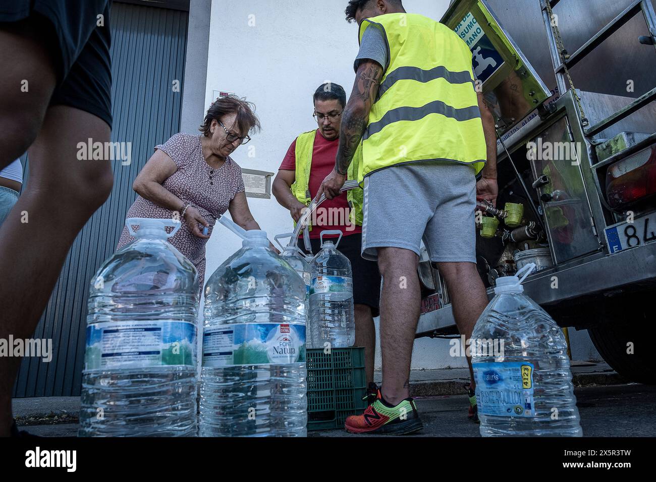 Drought, distribution of drinking water by tanker truck to the citizens ...