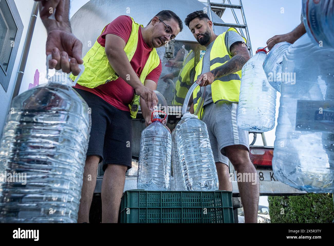 Drought, distribution of drinking water by tanker truck to the citizens ...