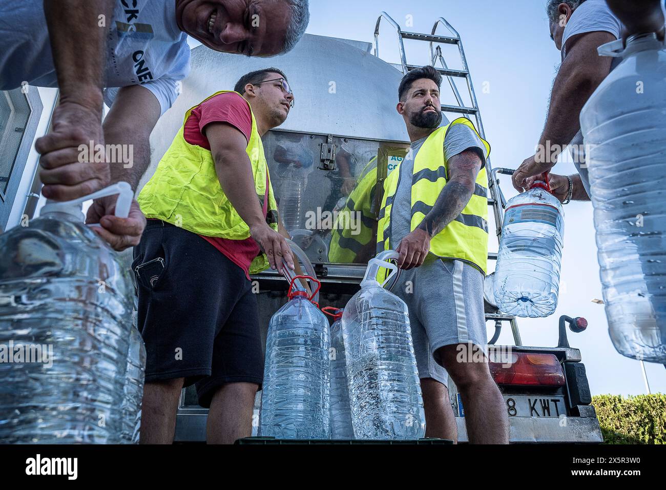 Drought, distribution of drinking water by tanker truck to the citizens ...