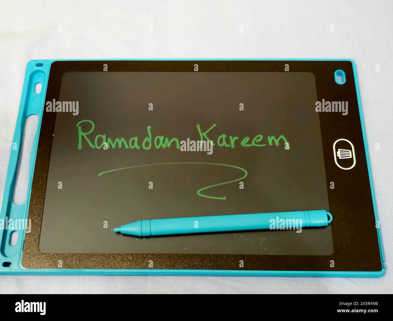 Happy Ramadan Kareem on LCD writing tablet of environmental protection ...