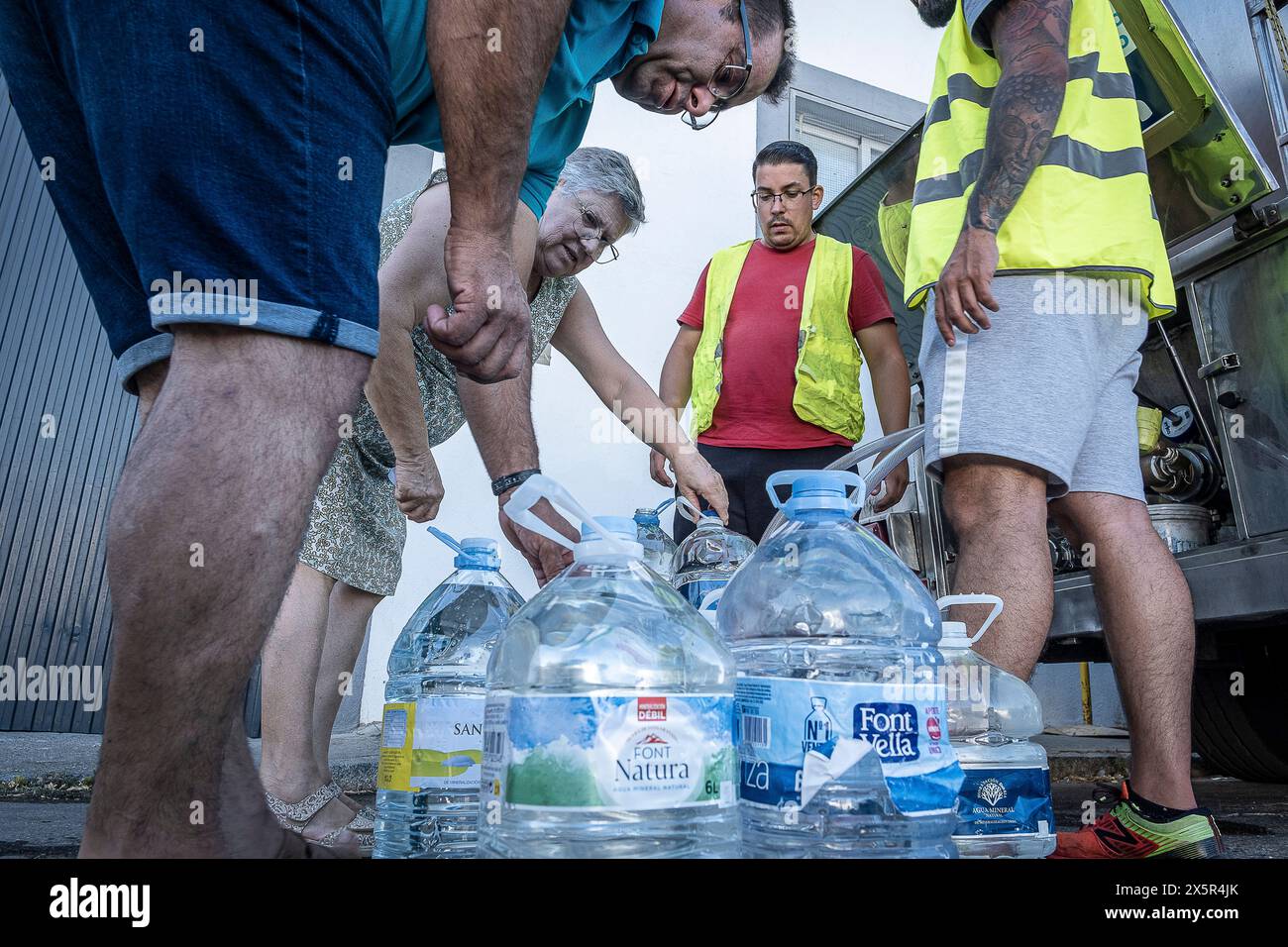 Drought, distribution of drinking water by tanker truck to the citizens ...