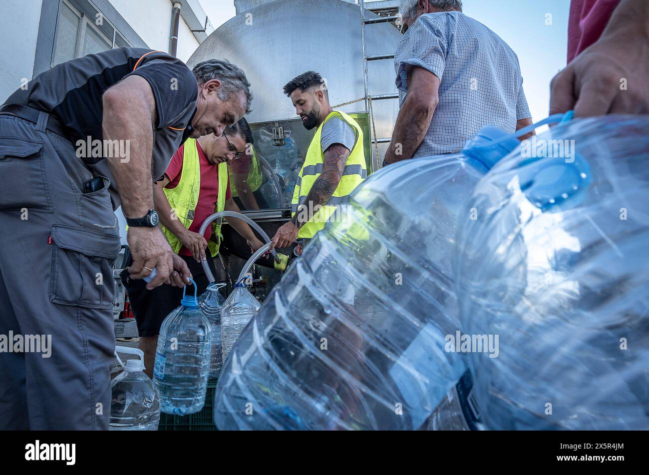 Drought, distribution of drinking water by tanker truck to the citizens ...