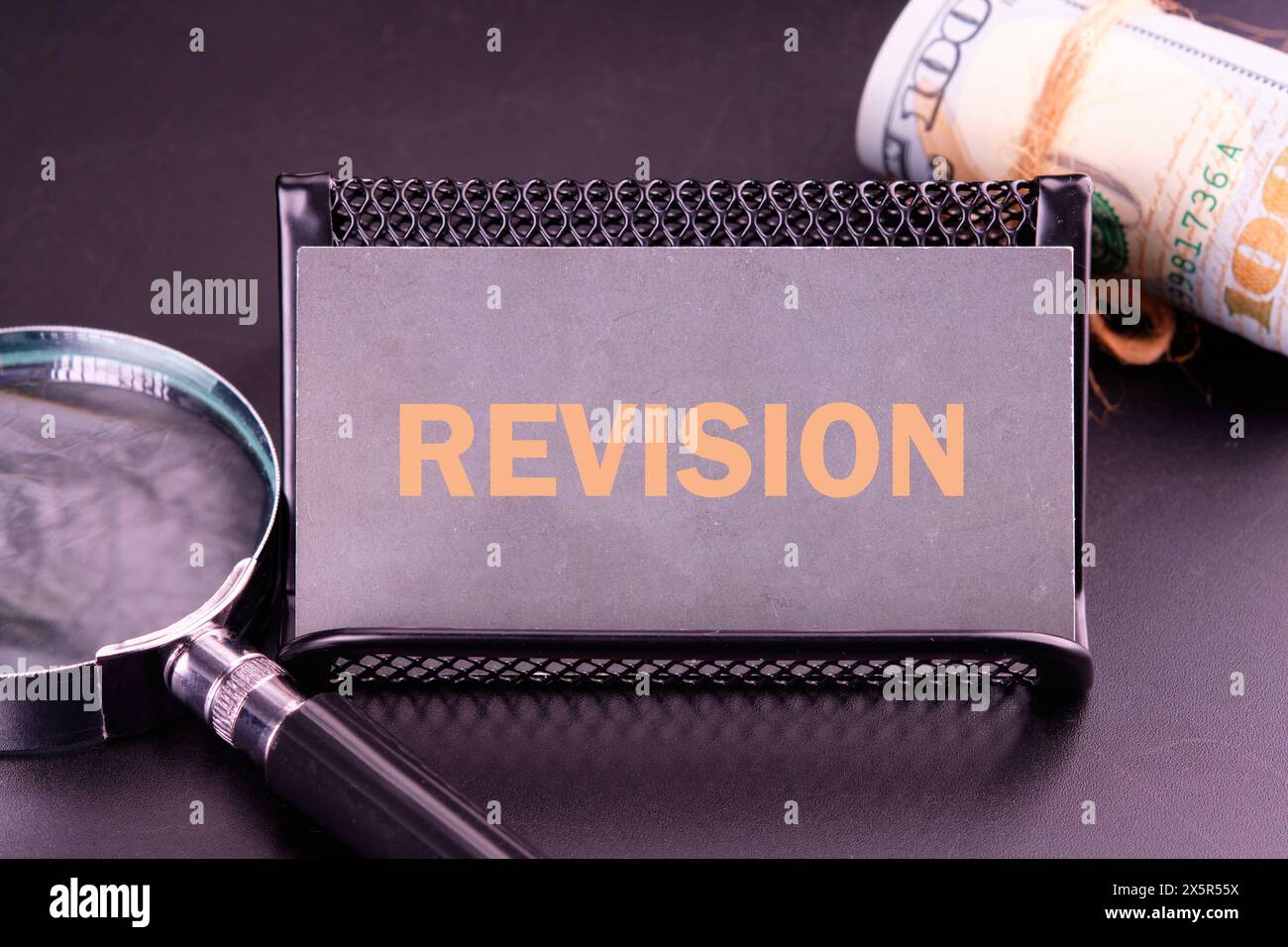 Conceptual revision symbol. REVISION word written on a gray business ... Conceptual revision symbol. REVISION word written on a gray business ...