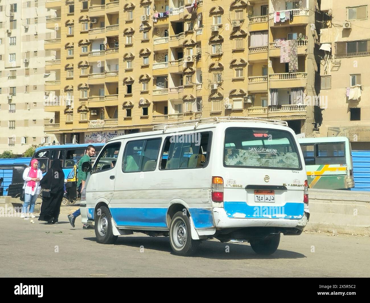 Cairo, Egypt, April 4 2024: Cairo transportation vehicles for passengers, minibus, microbus, or ...