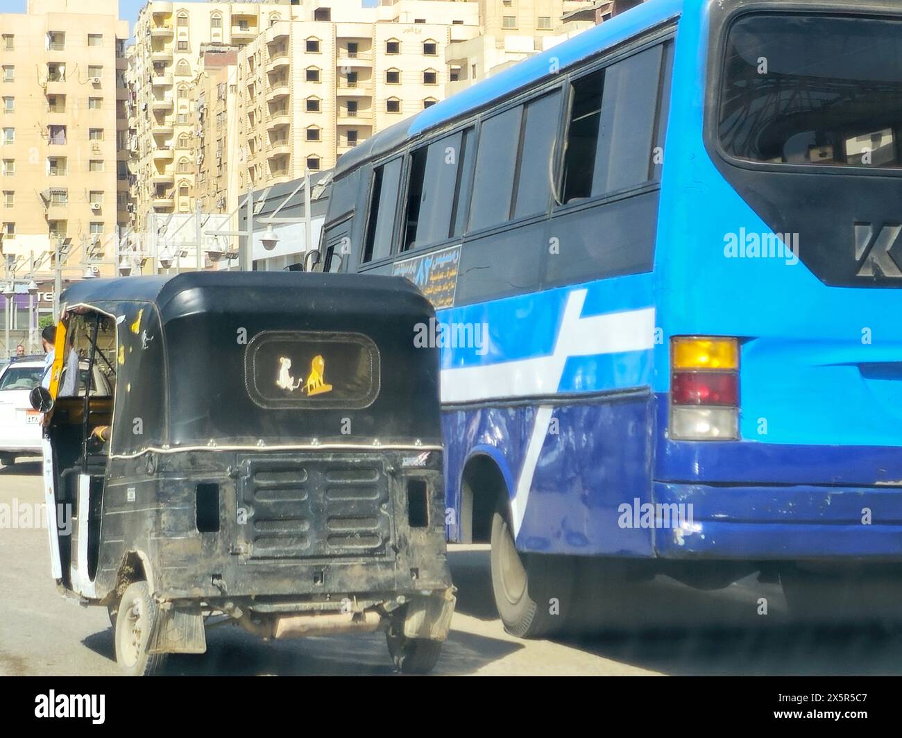 Cairo, Egypt, April 4 2024: auto rickshaw, baby taxi, mototaxi, pigeon ...