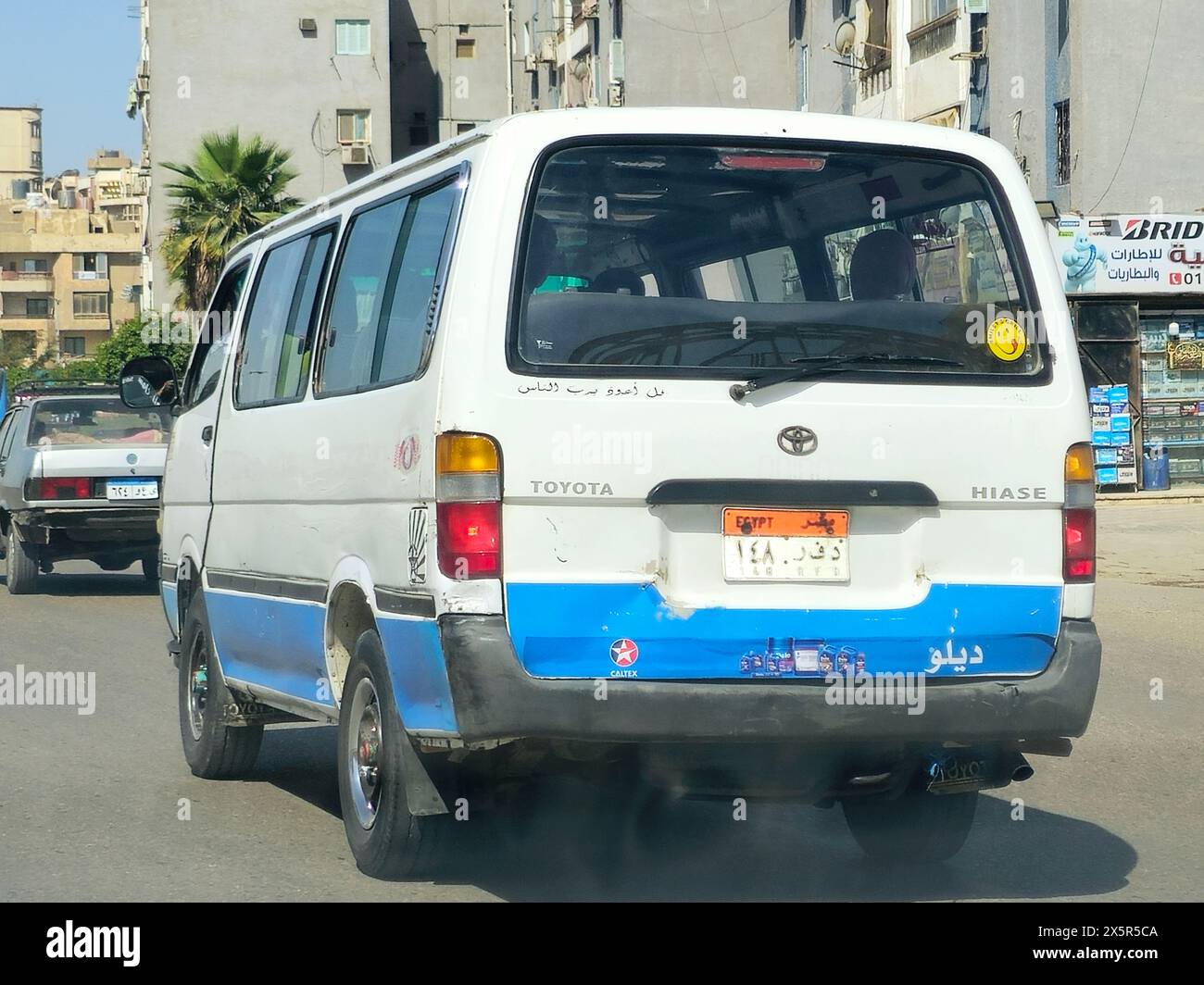 Cairo, Egypt, April 4 2024: Cairo transportation vehicles for passengers, minibus, microbus, or ...