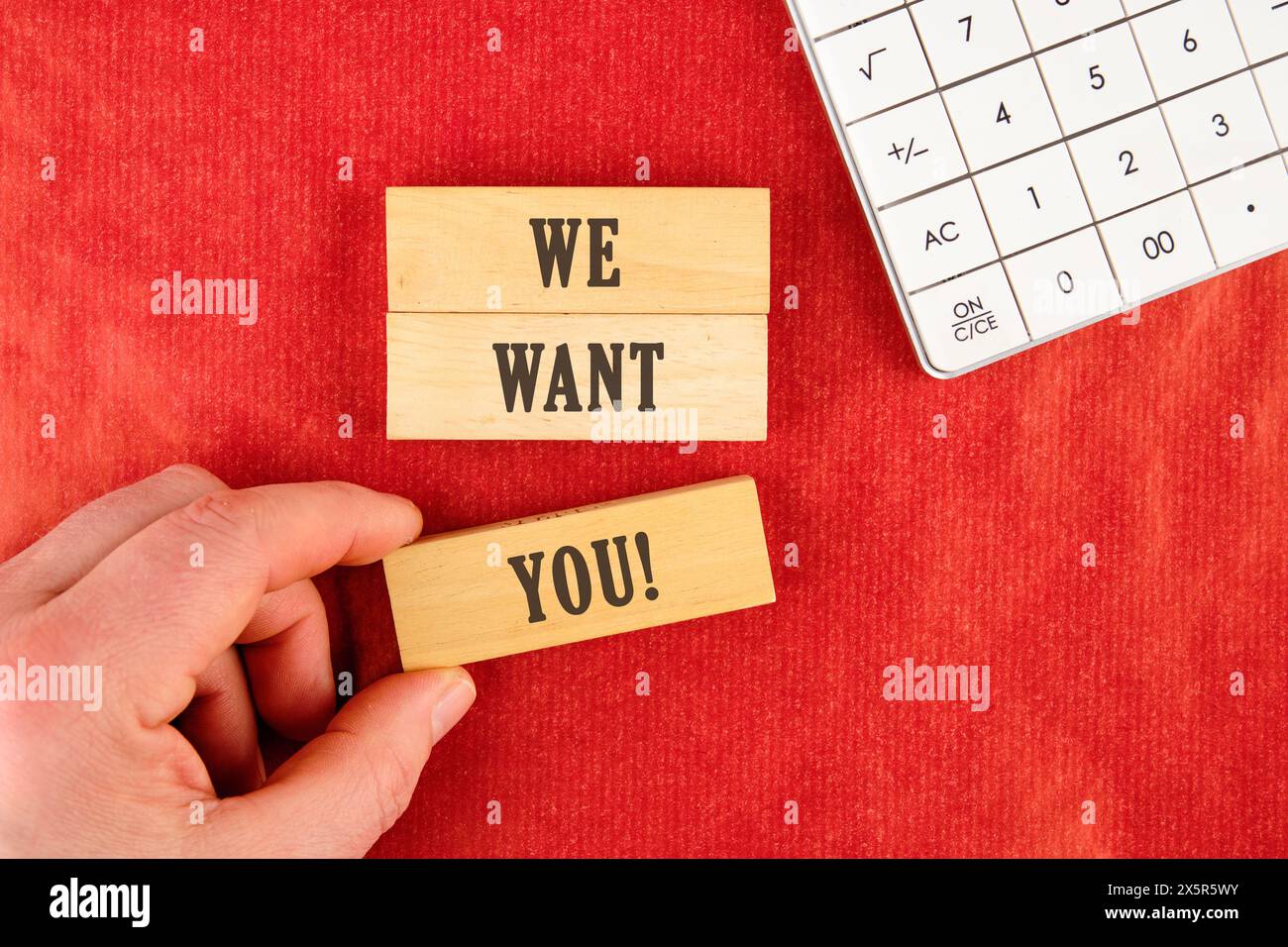 We want you text is made up of wooden blocks on a red background Stock ...