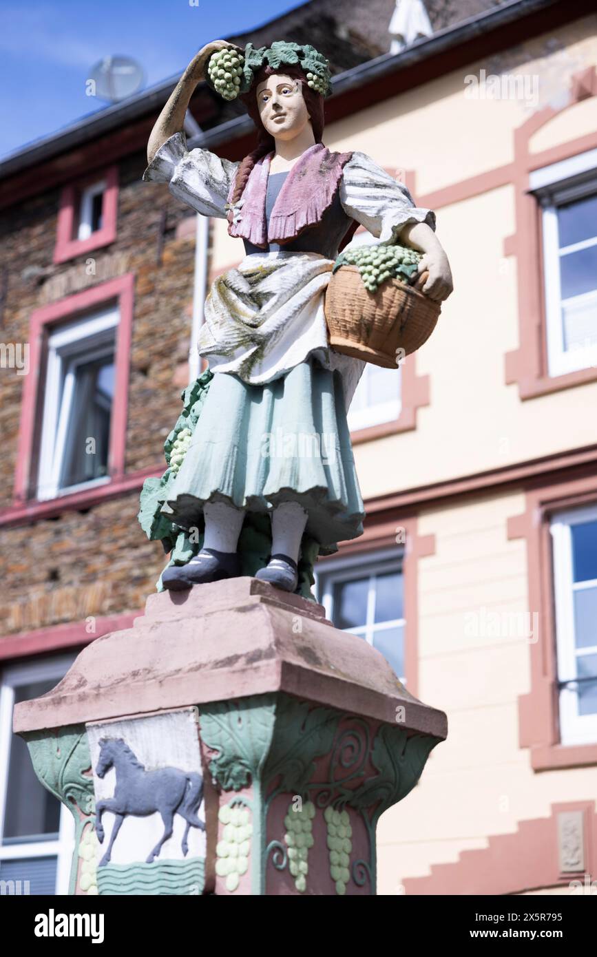 Historic fountain with statue on the market square in the town centre ...