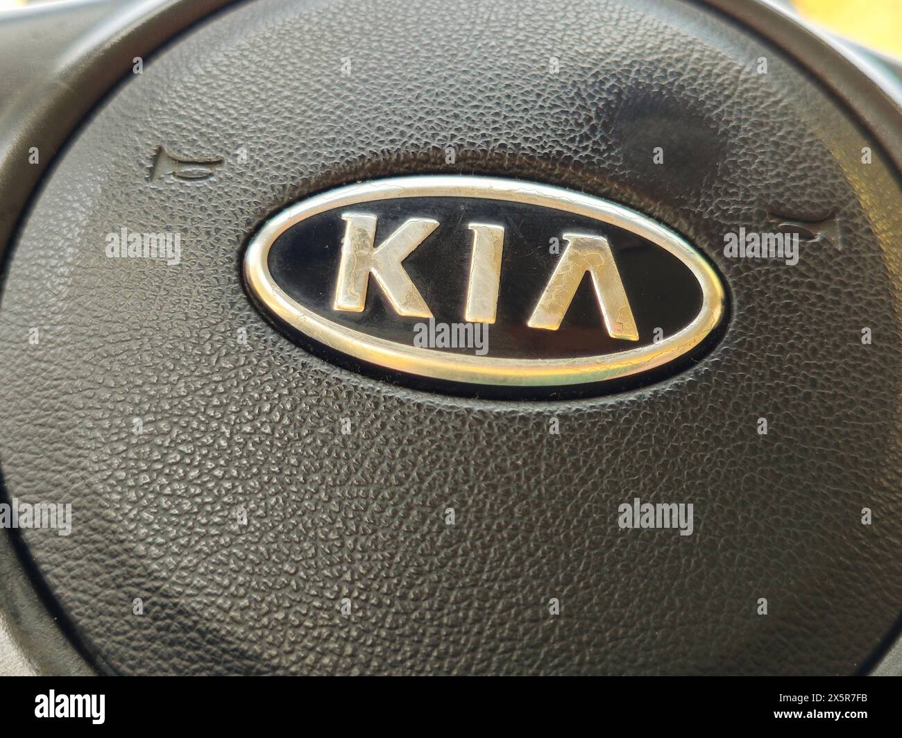 Cairo, Egypt, May 1 2024: KIA sign on a steering wheel of Cerato 2011 ...