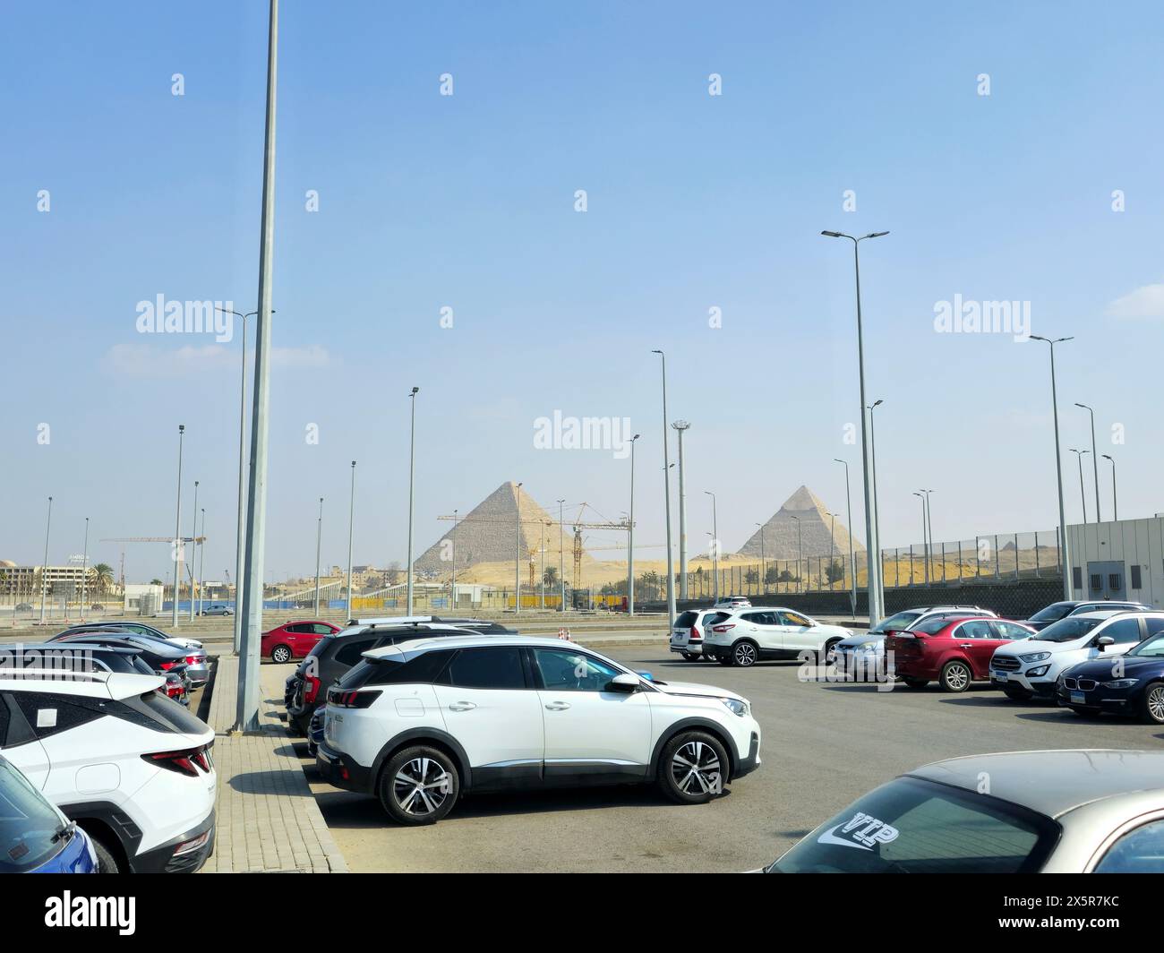 Giza, Egypt, April 13 2024: The Giza pyramid complex and the car ...