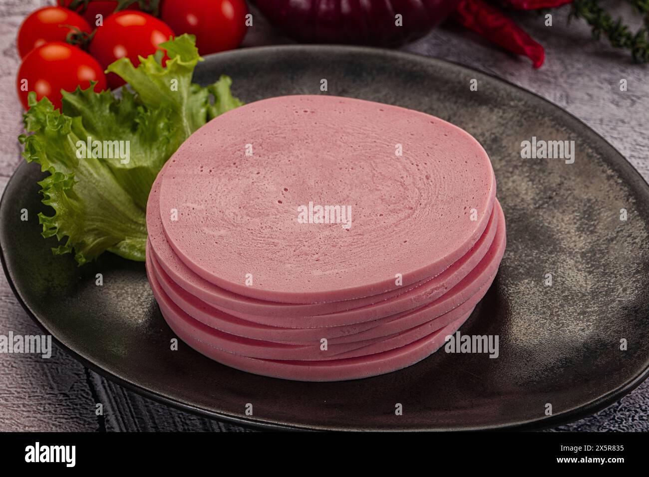 Boiled pork sliced sausage stack for breakfast Stock Photo - Alamy