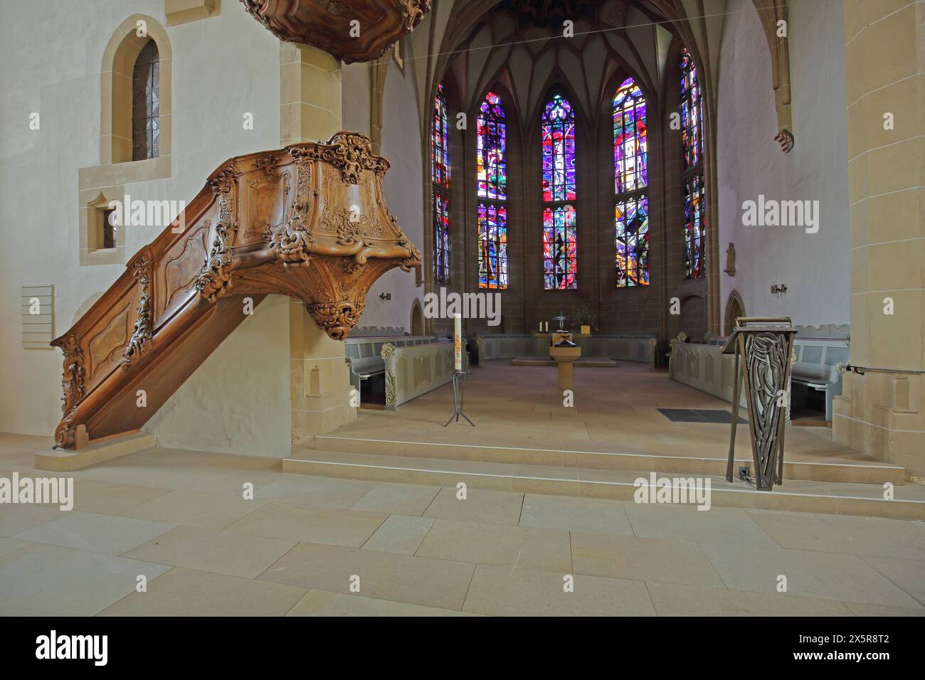 Pulpit with wood carving and chancel, interior view, colourful, church ...