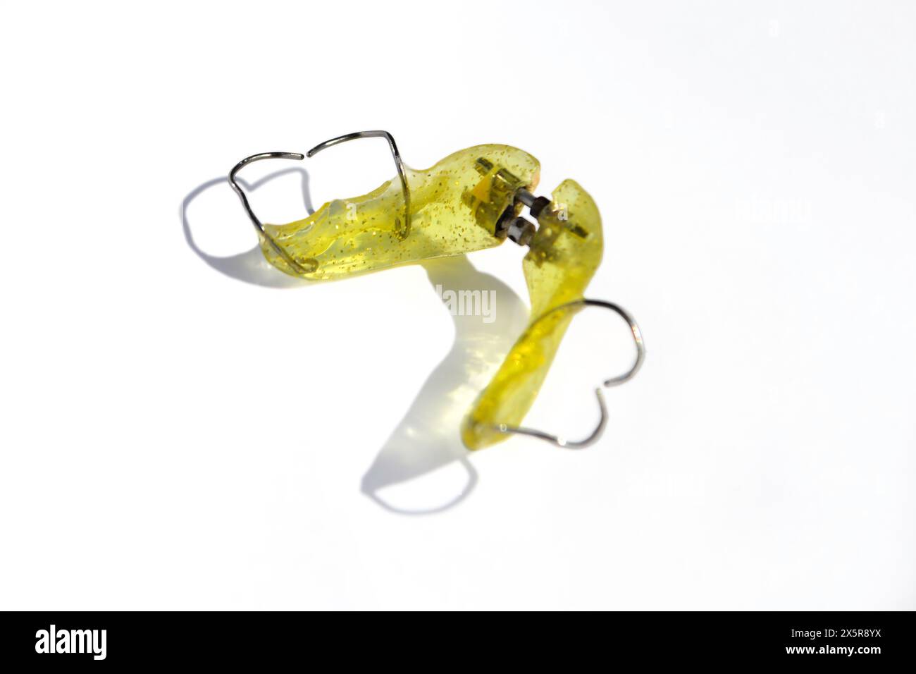 Close up of pink removable dental plate maxilla retainer isolated on ...