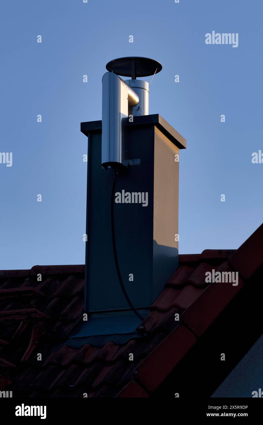 Retrofitted chimney on roof, with dust separator, electrostatic ...