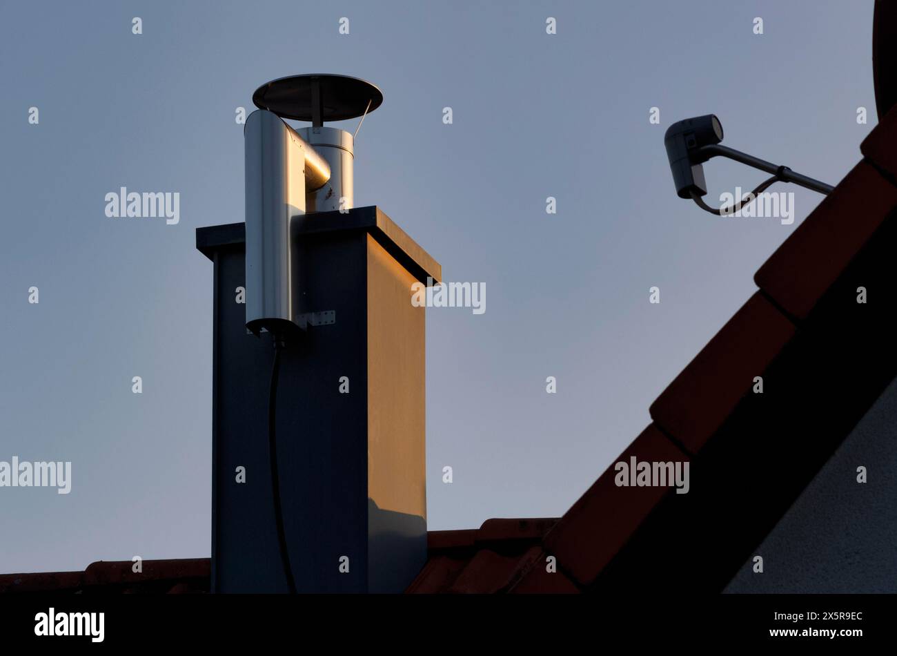 Retrofitted chimney on roof, with dust separator, electrostatic ...