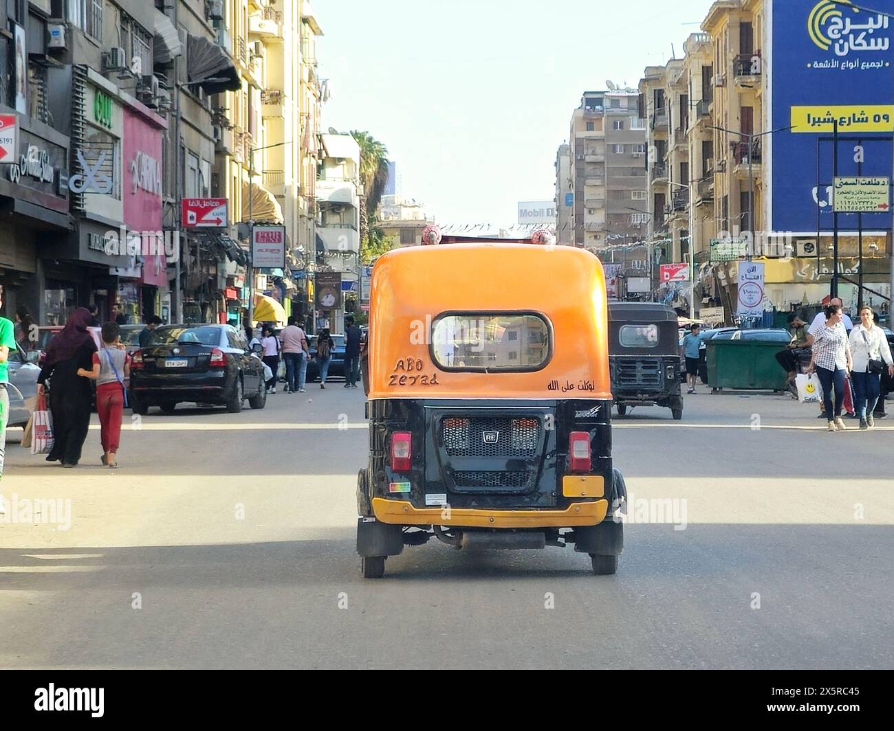 Cairo, Egypt, April 19 2024: auto rickshaw, baby taxi, mototaxi, pigeon ...