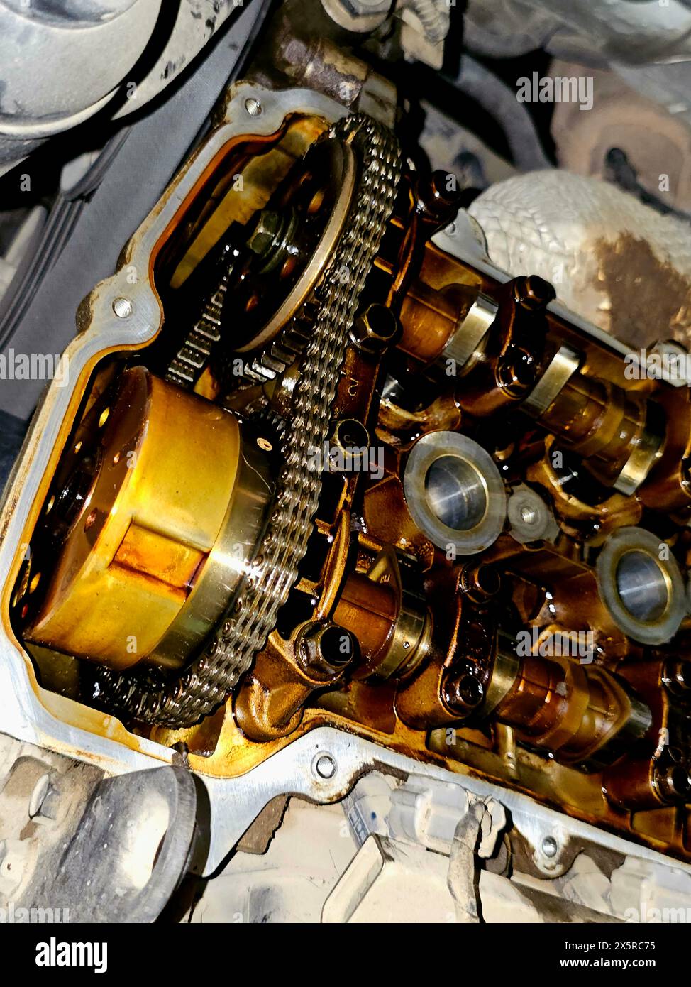 maintenance, service and repair of a car engine and cam cover rocker ...