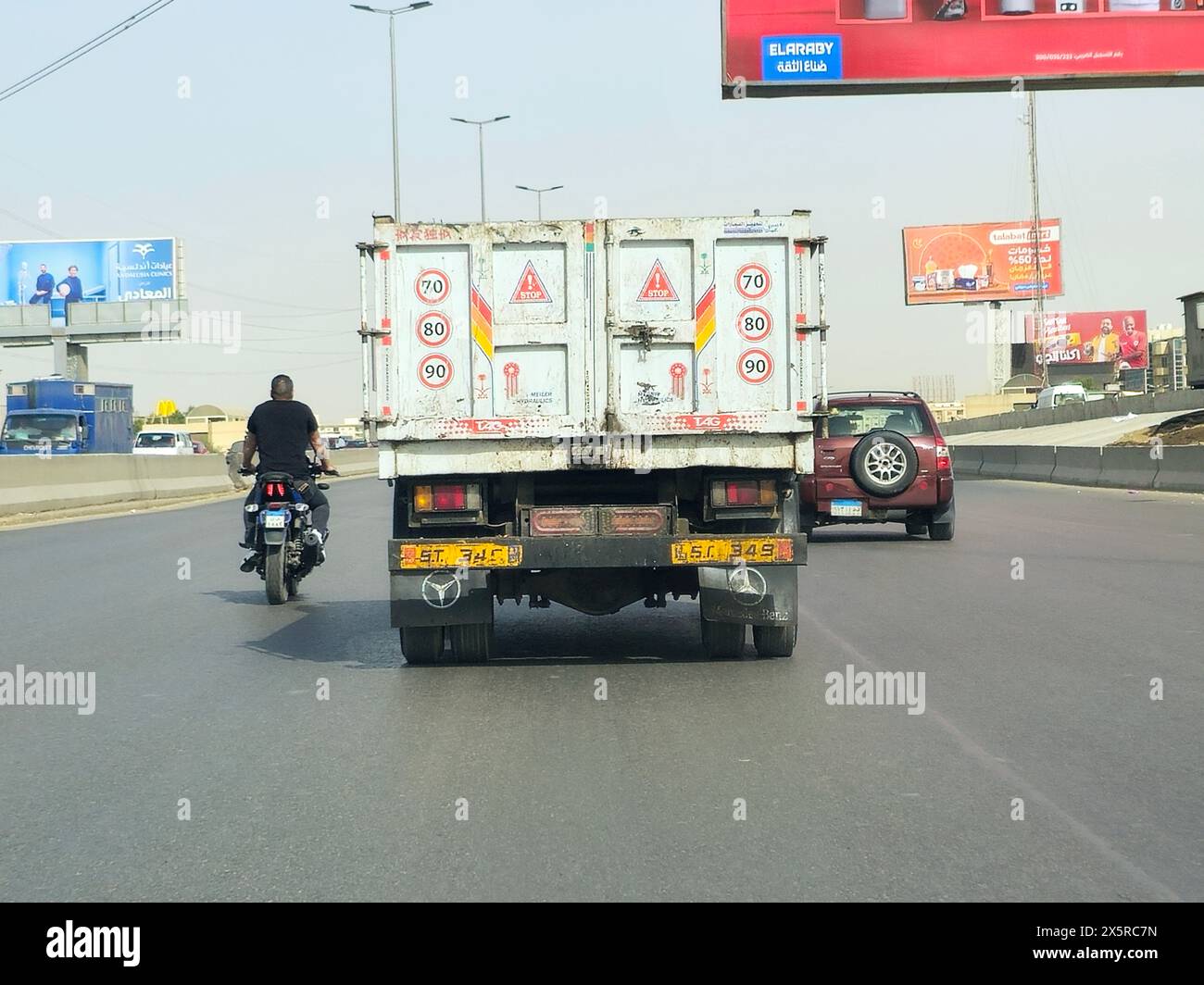 Cairo, Egypt, April 22 2024: A transportation truck on the road for ...