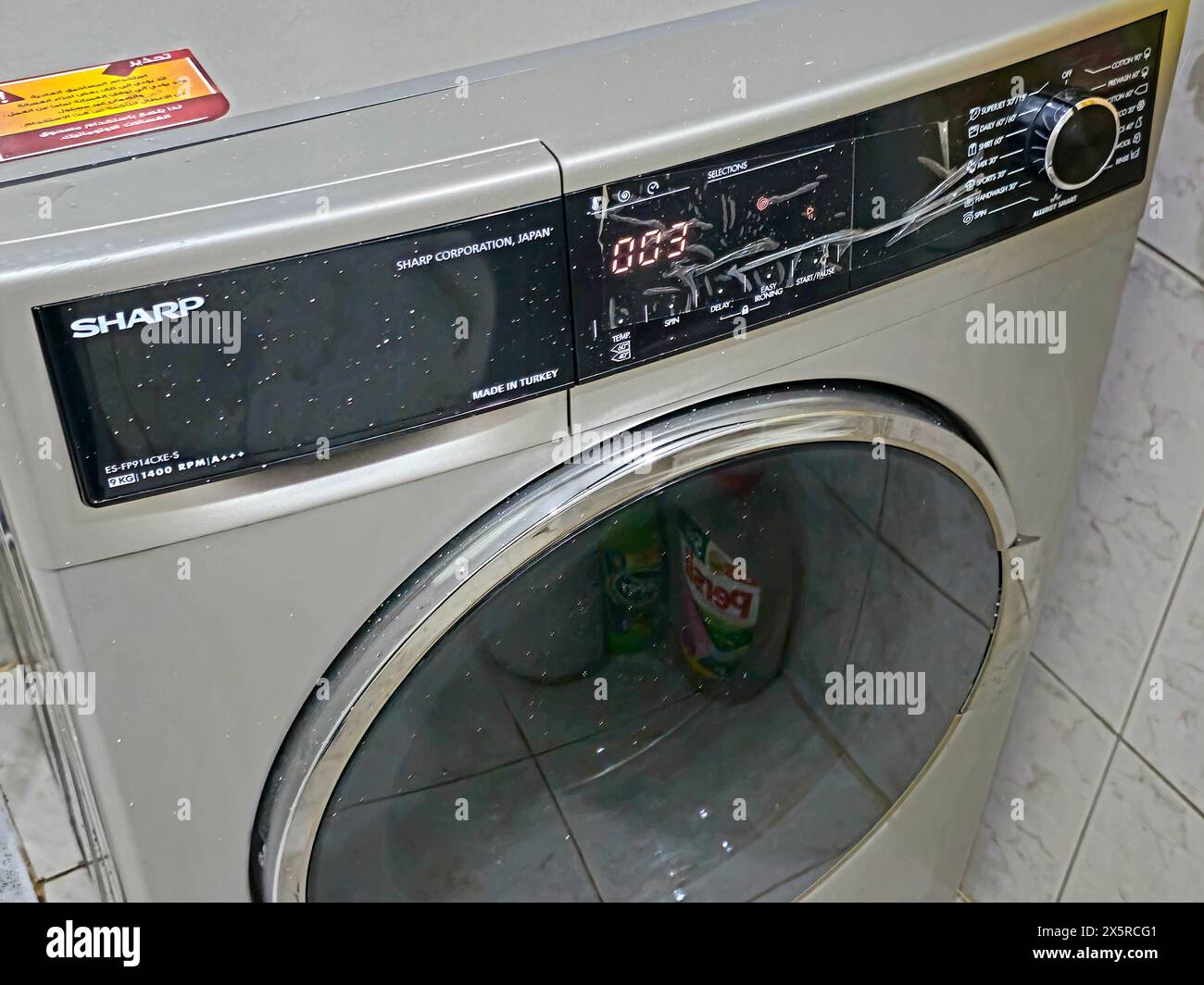 Cairo, Egypt, April 26 2024: Sharp full automatic washing machine 9 KG ...