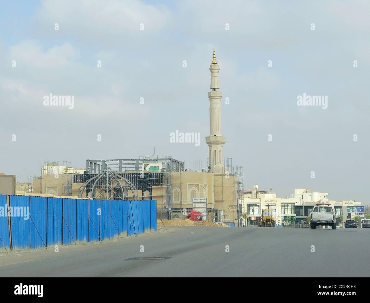 Cairo, Egypt, April 27 2024: A construction site of a new mosque with a ...