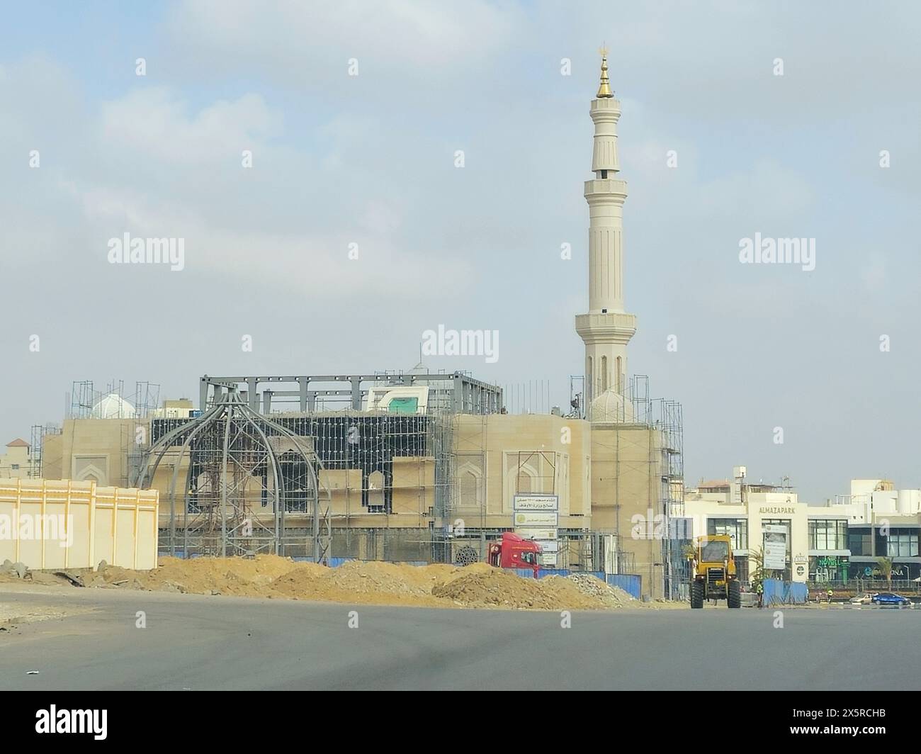 Cairo, Egypt, April 27 2024: A construction site of a new mosque with a ...