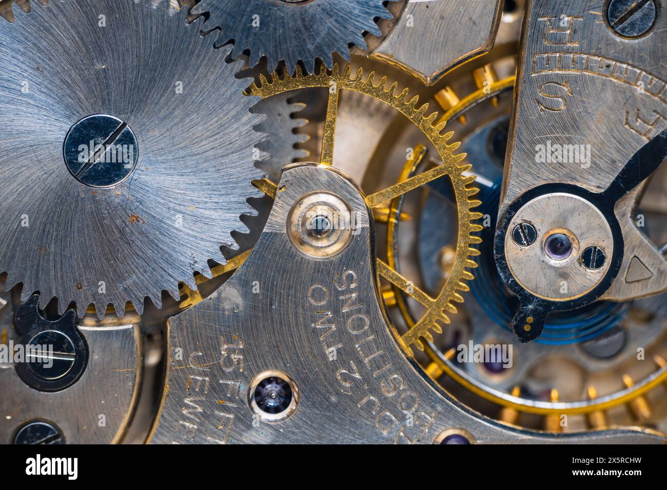 Pocket watch mechanism. Mechanical steel clockwork with cogwheel and ...