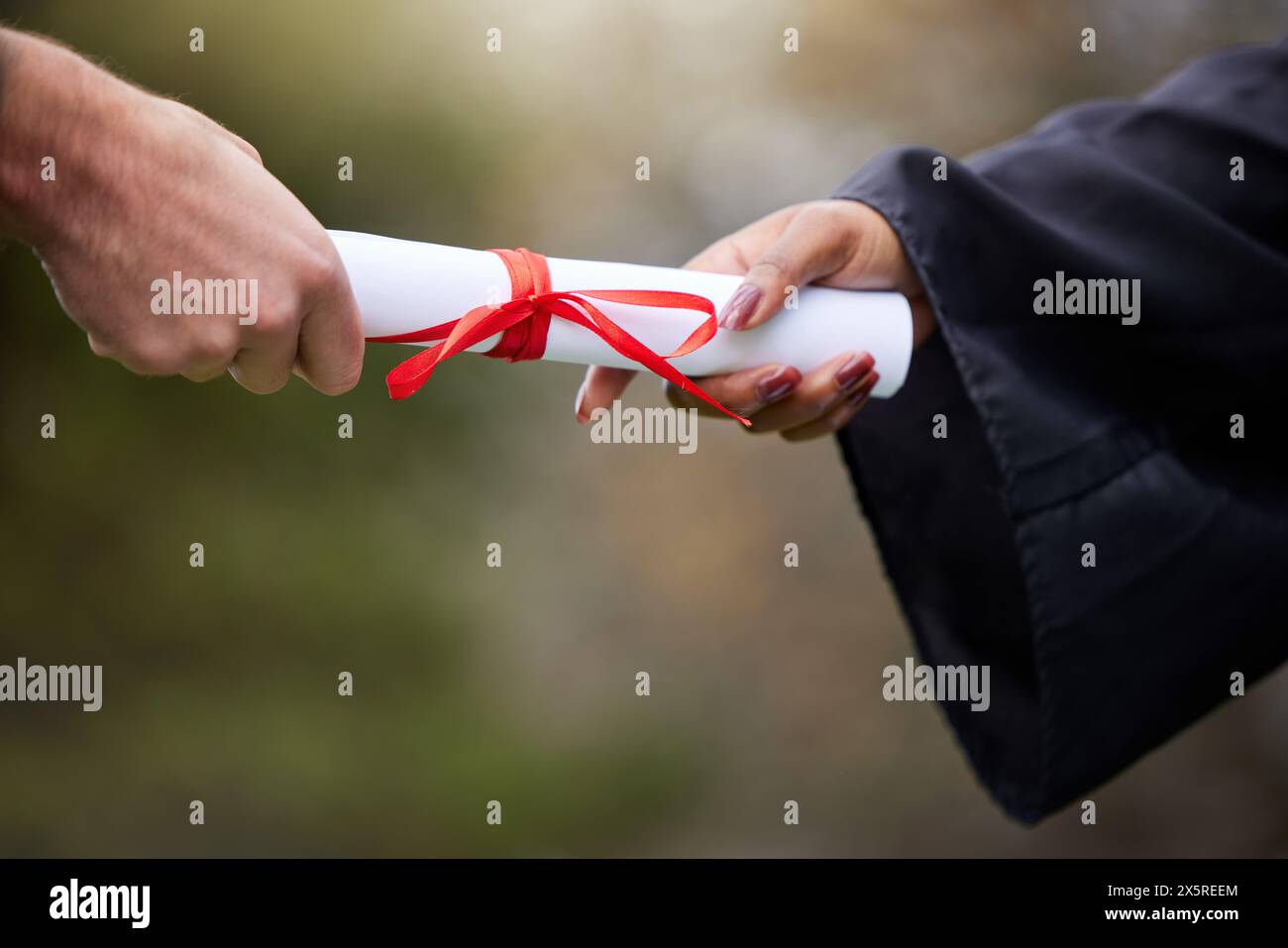 Student, hands and giving diploma for graduation in outdoor, learning ...
