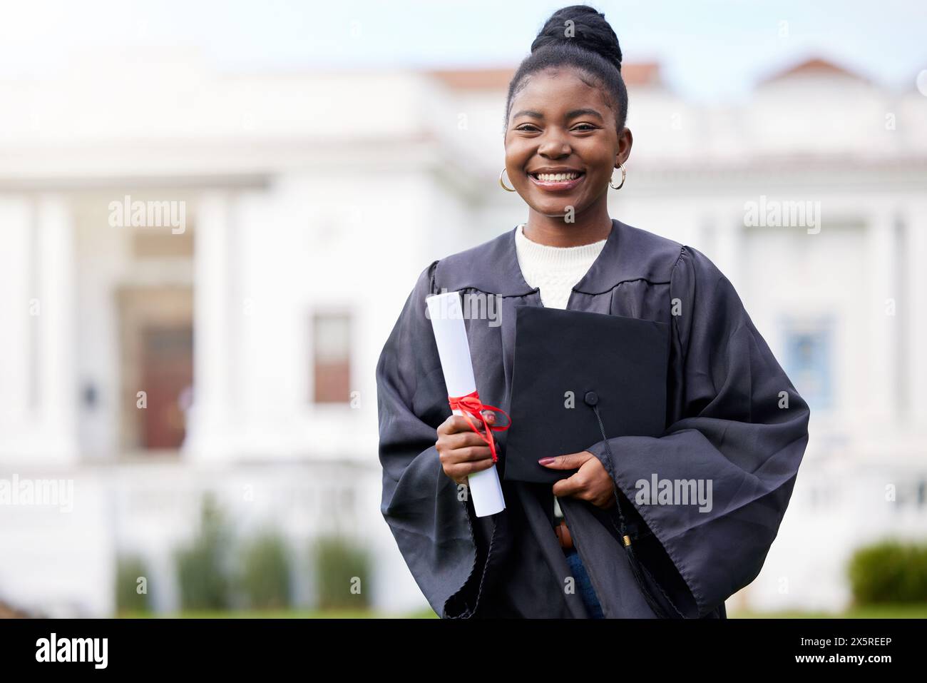 University, portrait or happy black woman at campus for graduation ...