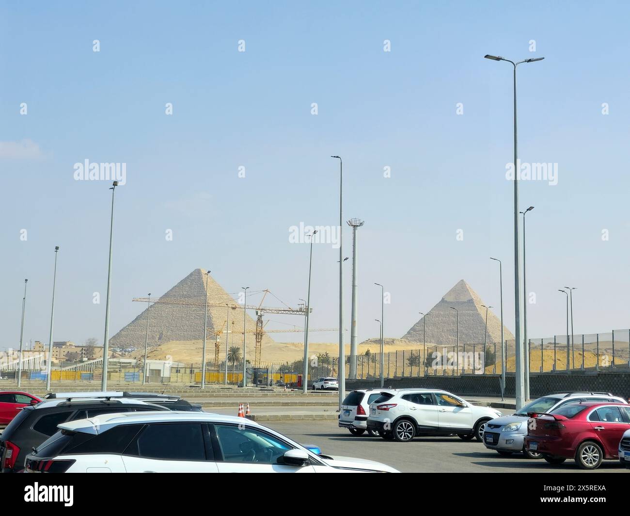 Giza, Egypt, April 13 2024: The Giza pyramid complex and the car ...