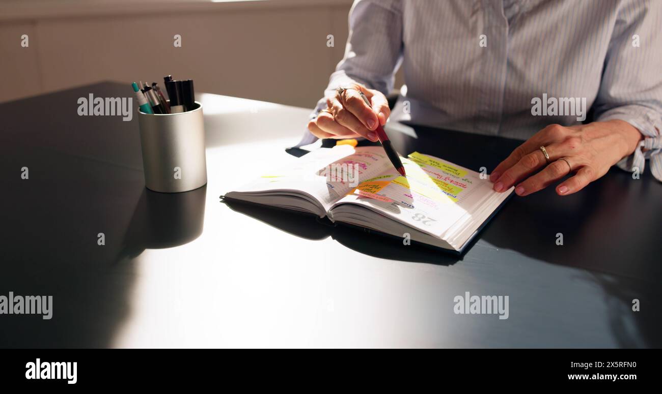 Planning Calendar Agenda And Appointment Schedule At Desk Stock Photo ...