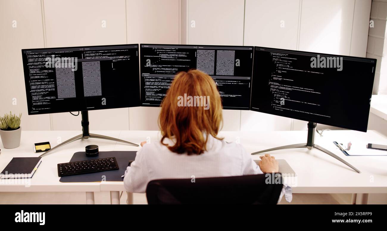Software Programmer Or Coder Woman Using Office Computer Stock Photo - Alamy