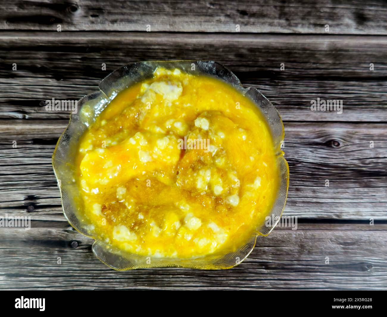 A sweet mixture dessert of rice pudding, milk cream qishta, basbousa ...