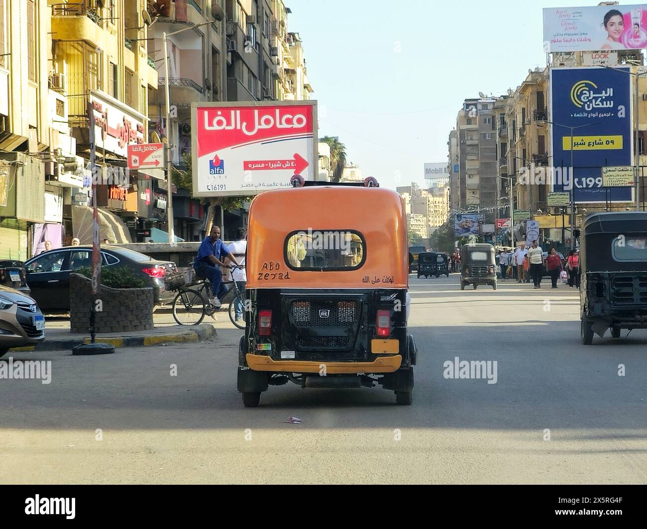 Cairo, Egypt, April 19 2024: auto rickshaw, baby taxi, mototaxi, pigeon ...