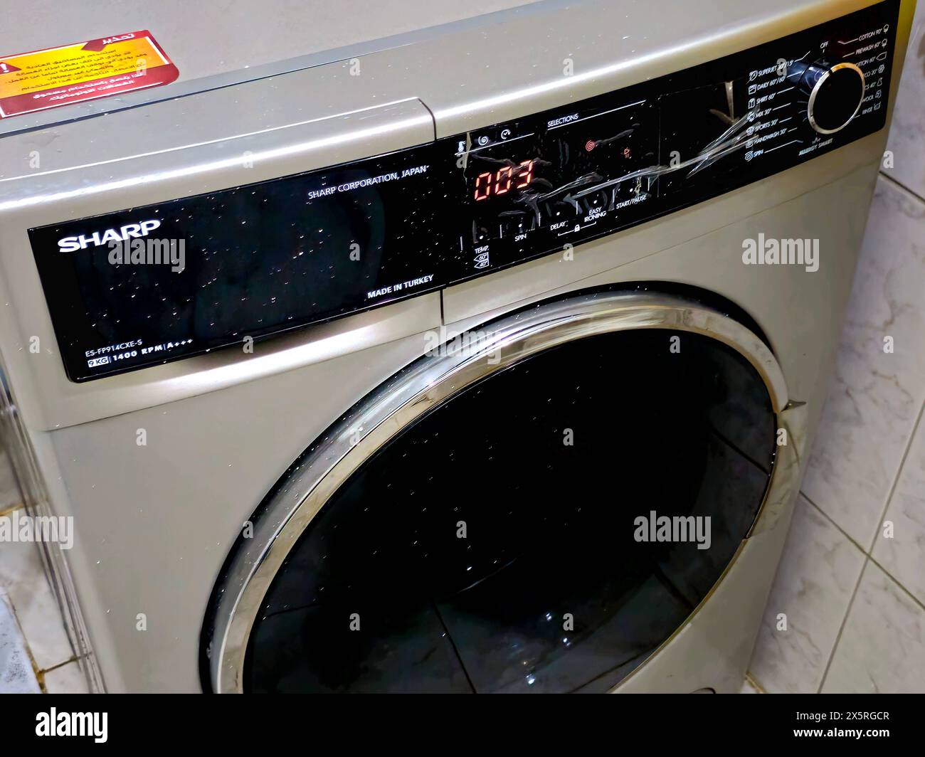 Cairo, Egypt, April 26 2024: Sharp full automatic washing machine 9 KG ...