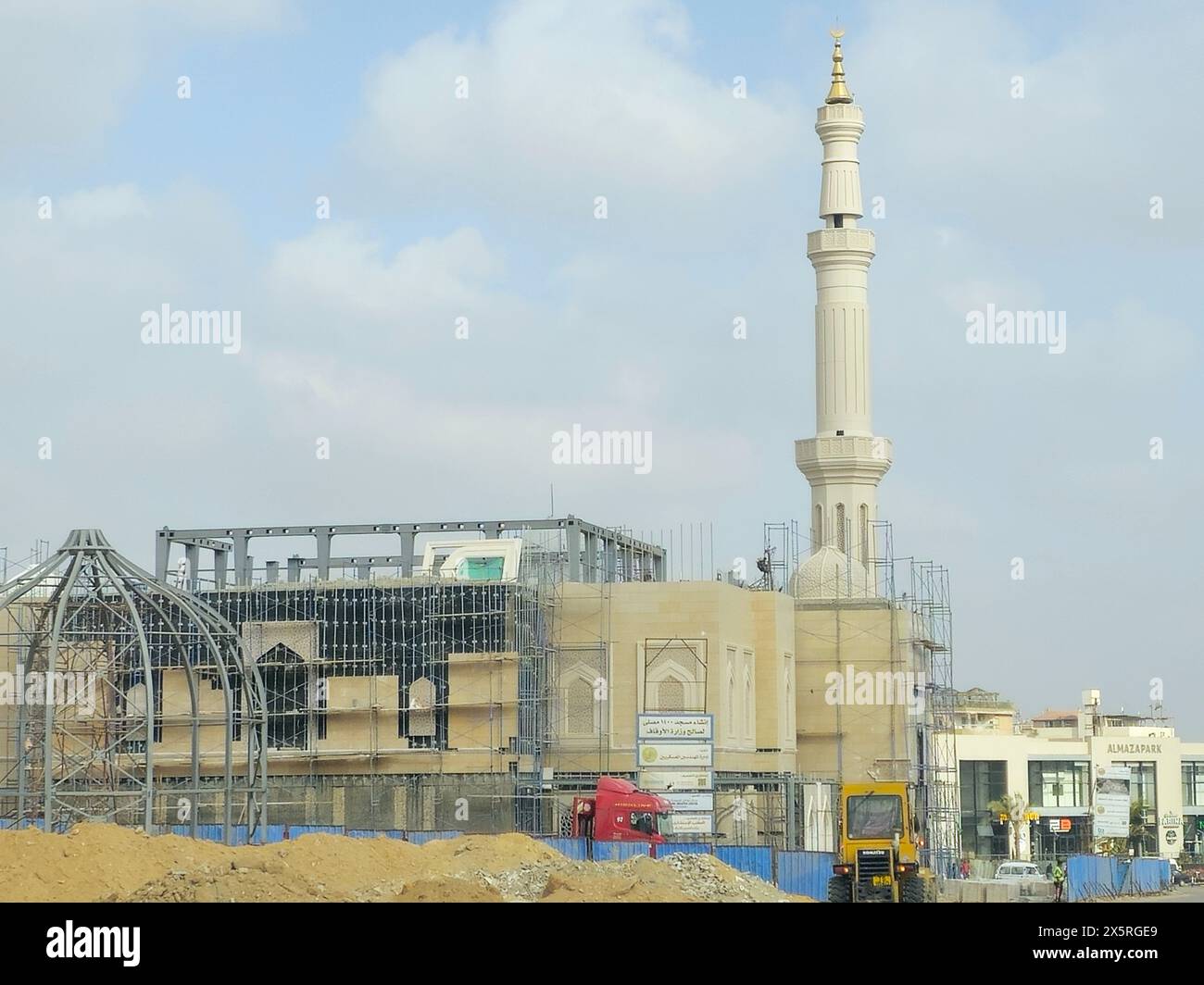 Cairo, Egypt, April 27 2024: A construction site of a new mosque with a ...