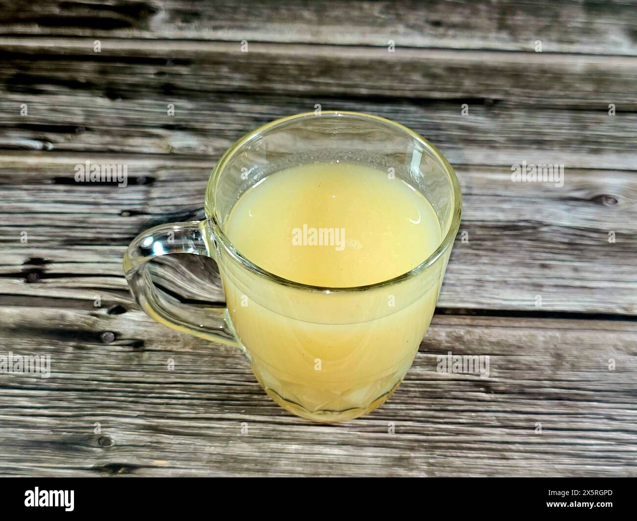 A glass of Guava juice, a common tropical fruit cultivated in many ...