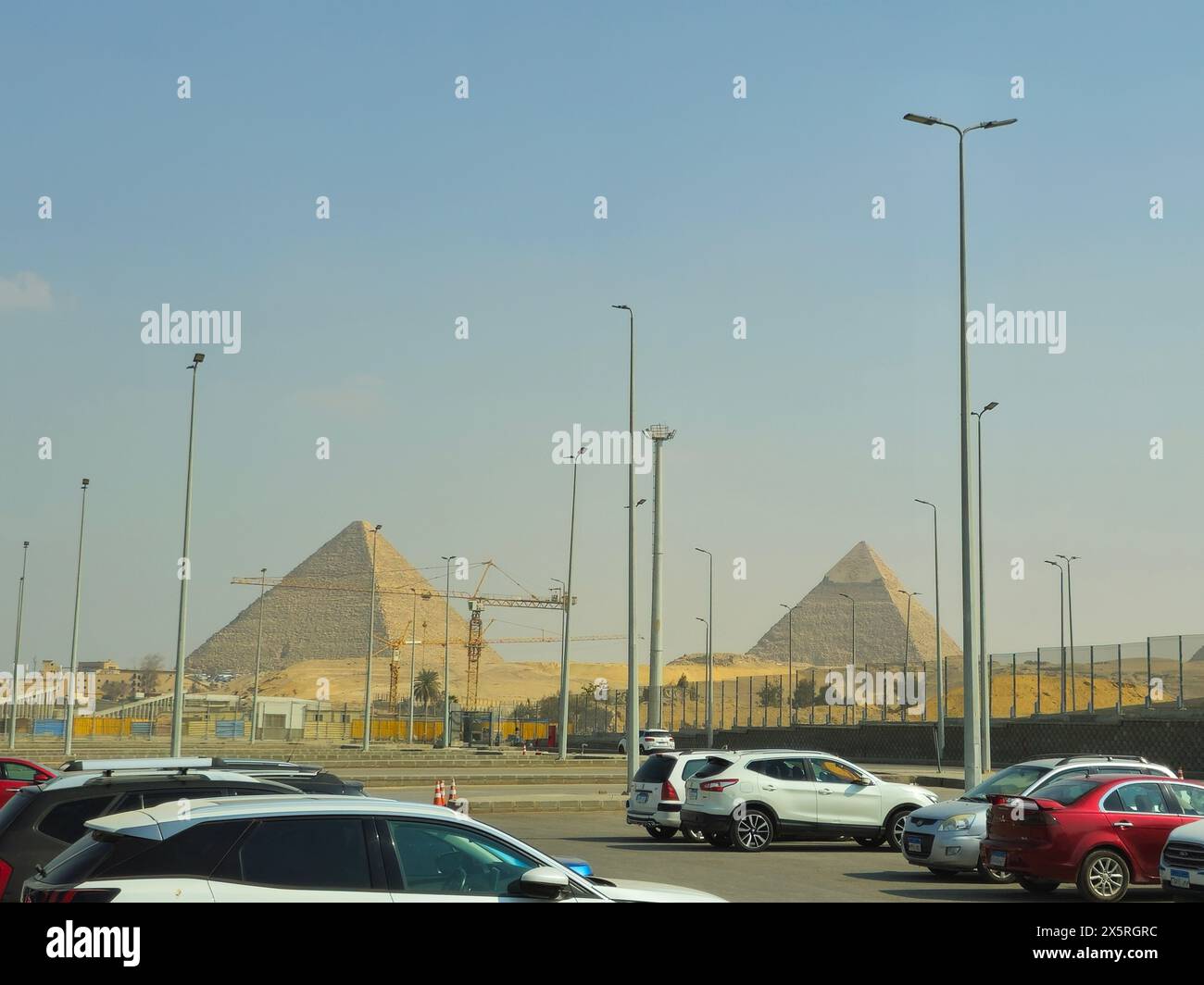 Giza, Egypt, April 13 2024: The Giza pyramid complex and the car ...