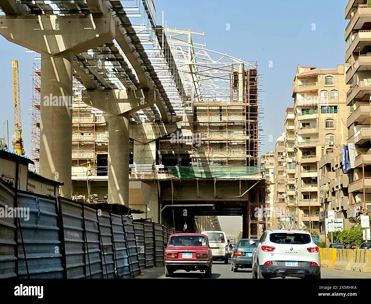 Cairo, Egypt, April 24 2024: A monorail station site that is under construction with scaffolds ...